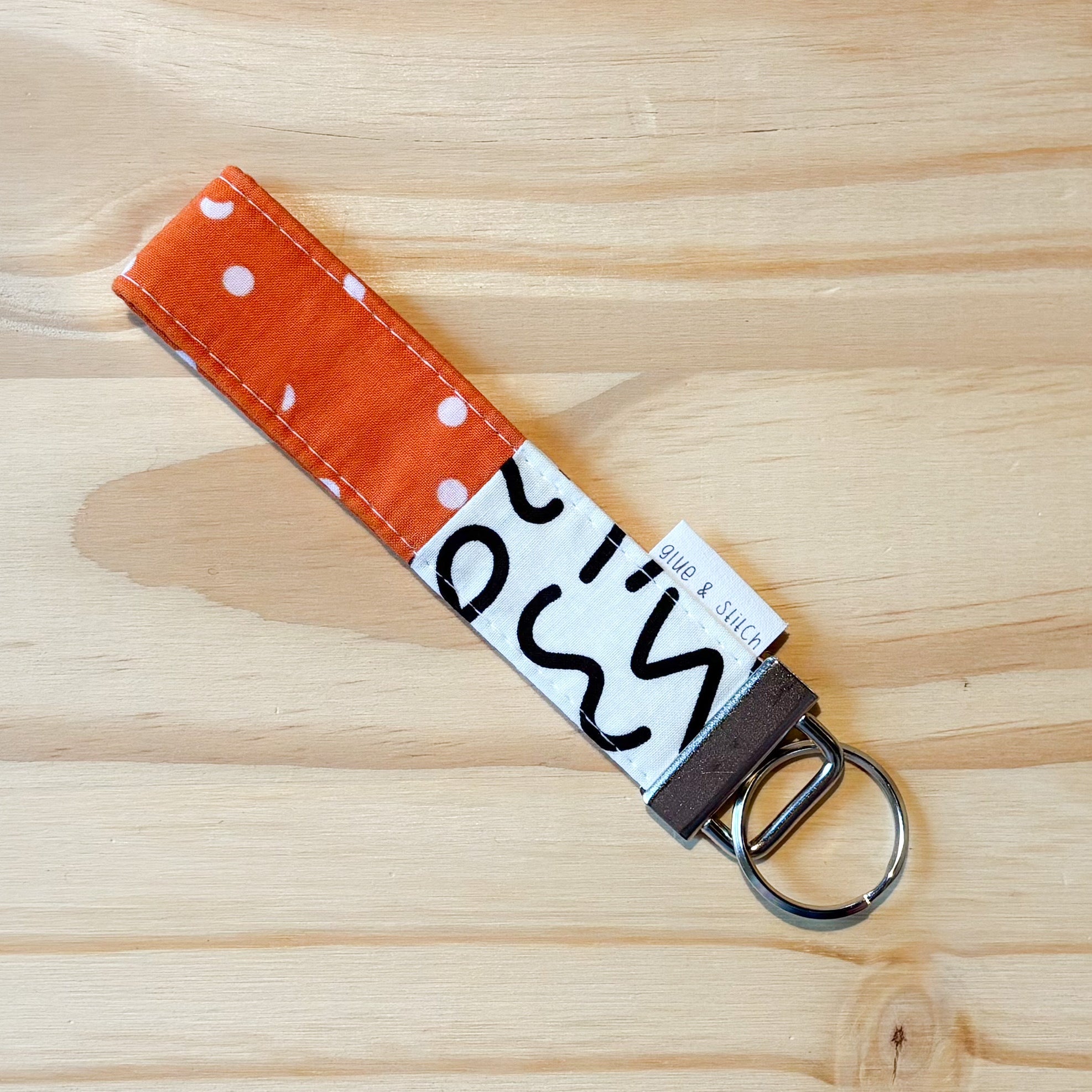 Black and White Squiggle and Orange Dot Key Fob – Glue & Stitch